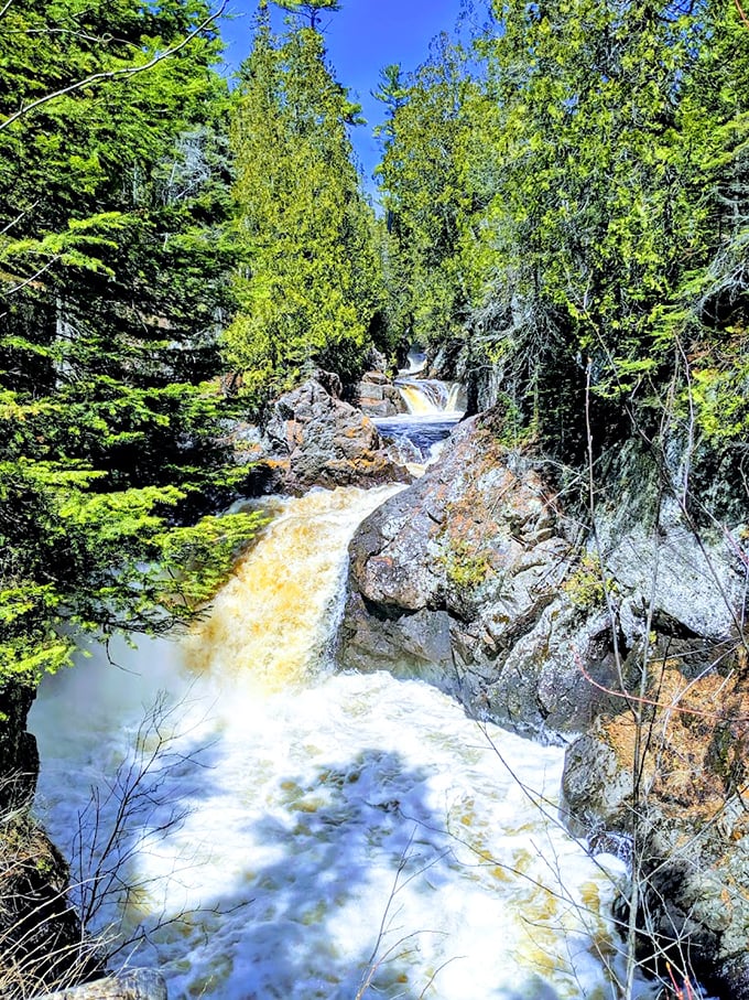 Nature's own water park! Cascade Falls serves up a buffet of aquatic delights, no inflatable unicorn float required.