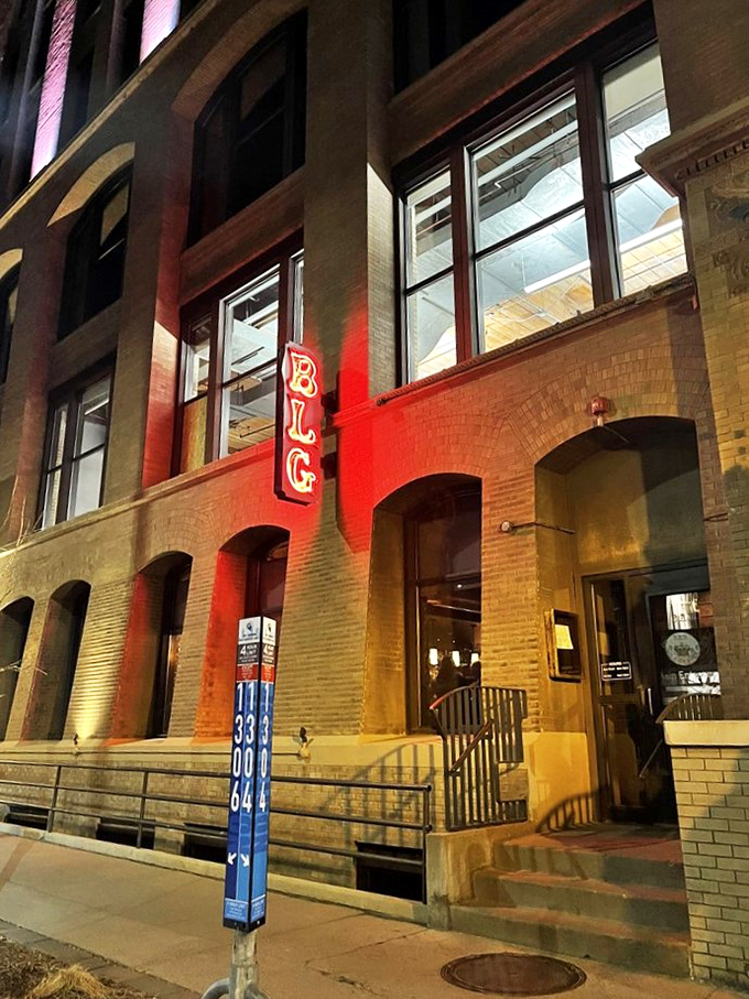 Bustling energy meets culinary artistry. Bar La Grassa's windows offer a tantalizing glimpse of pasta paradise within.