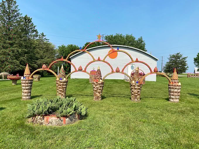 Concrete menagerie meets sparkle central. It's like Dr. Seuss and Liberace collaborated on a theme park.