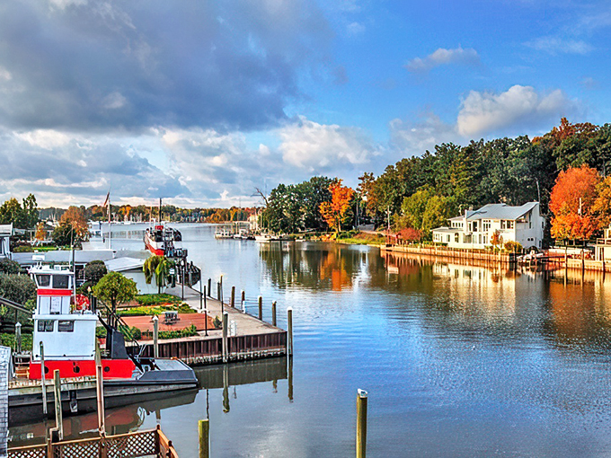 Fall paints Saugatuck's harbor in brilliant hues, while boats await their next summer adventure.