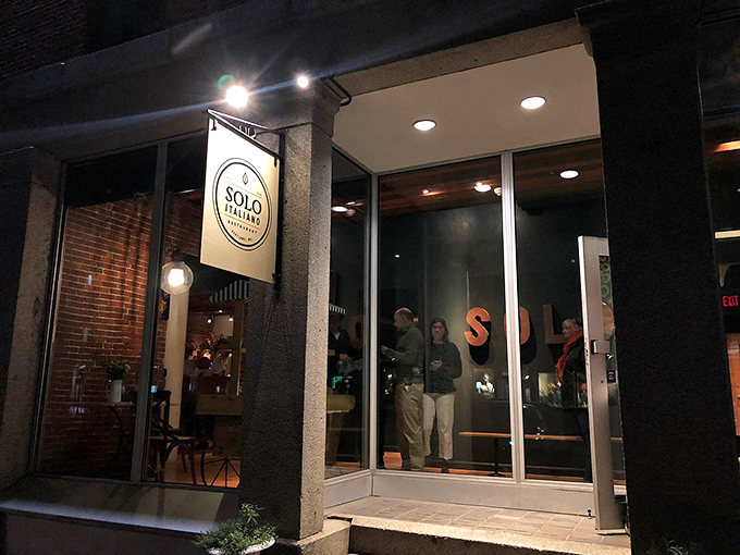 Solo Italiano after dark: When the pasta party really gets started. The warm glow promises a night of carb-loaded adventures.