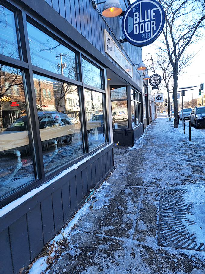 Winter wonderland meets burger paradise. The Blue Door Pub stands ready to warm hearts and fill bellies, snow or shine. Photo credit: Leah H