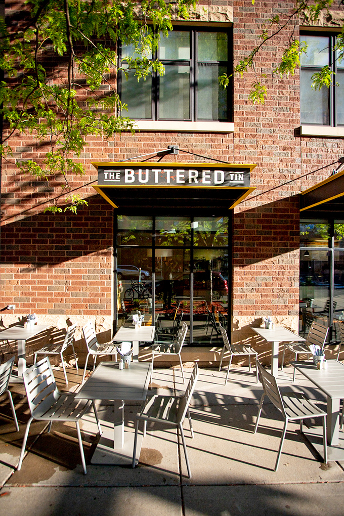 The Buttered Tin's outdoor seating is perfect for savoring pastries and pretending you're in a rom-com meet-cute scene. Photo credit: The Buttered Tin