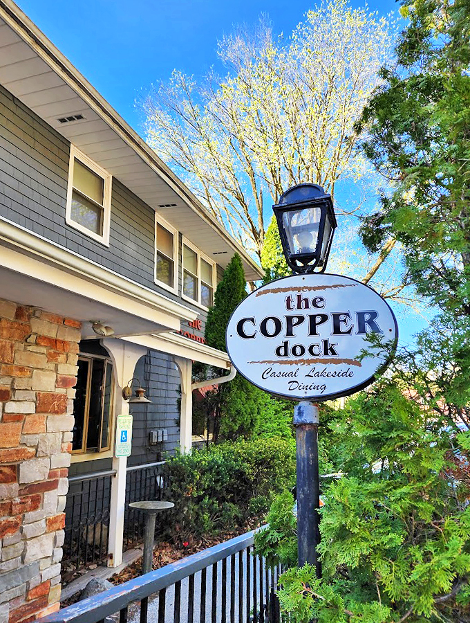 That vintage lamp post sign promises "Casual Lakeside Dining" - and in Wisconsin, that's code for "relax, you're among friends."