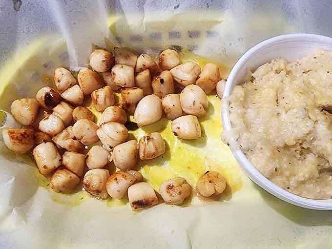 Buttery seared scallops and creamy grits that melt into every bite.