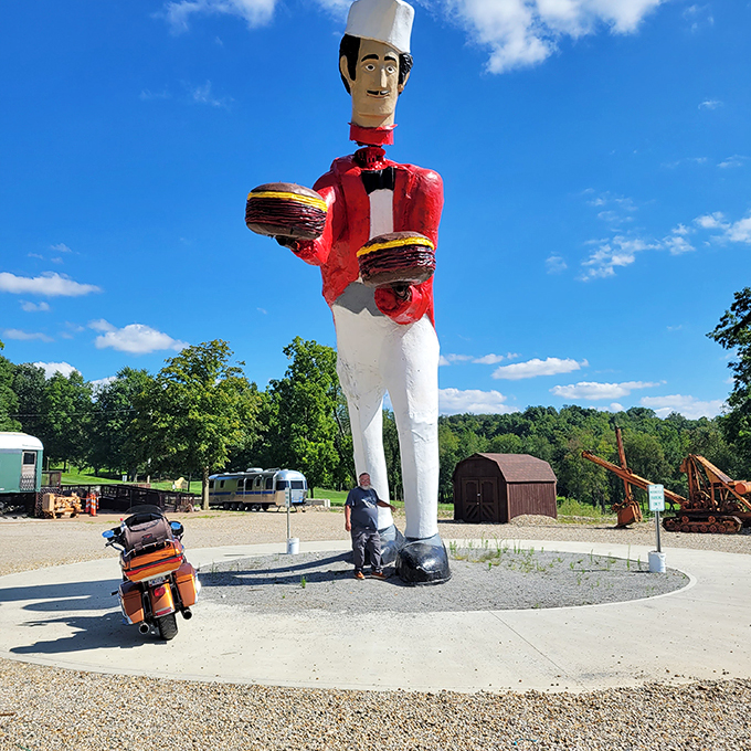 "Is it just me, or is that chef giving us the side-eye?" This colossal culinary character stands tall, serving up smiles and photo ops in equal measure.