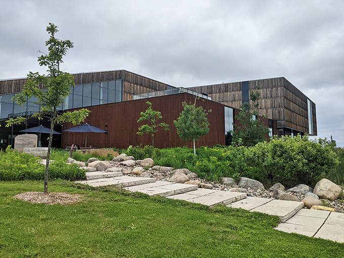 A modern marvel nestled in nature's embrace! The Bell Museum's sleek design beckons curious minds like a sci-fi portal to adventure.