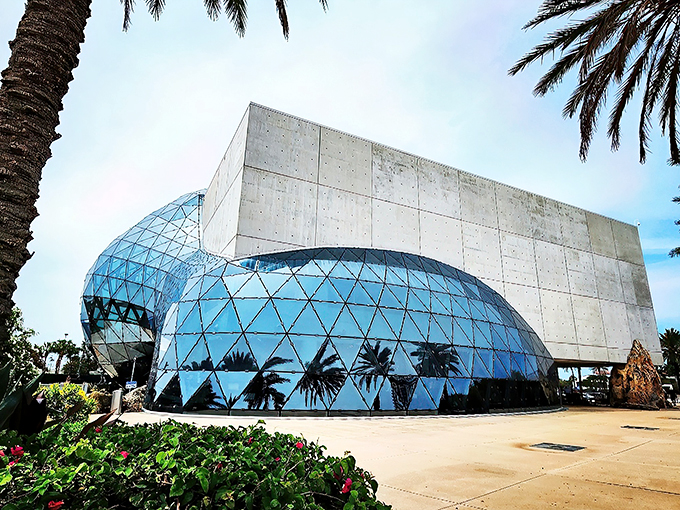 Buckle up, art lovers! This isn't your average beach ball - it's The Dal&iacute; Museum's mind-bending geodesic dome, ready to transport you into a world of surreal wonders.
