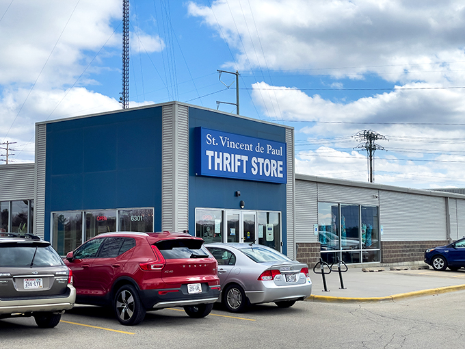 Blue skies and bargains await! This thrift store's exterior promises a treasure trove of pre-loved goodies inside. Who's ready for a shopping adventure?
