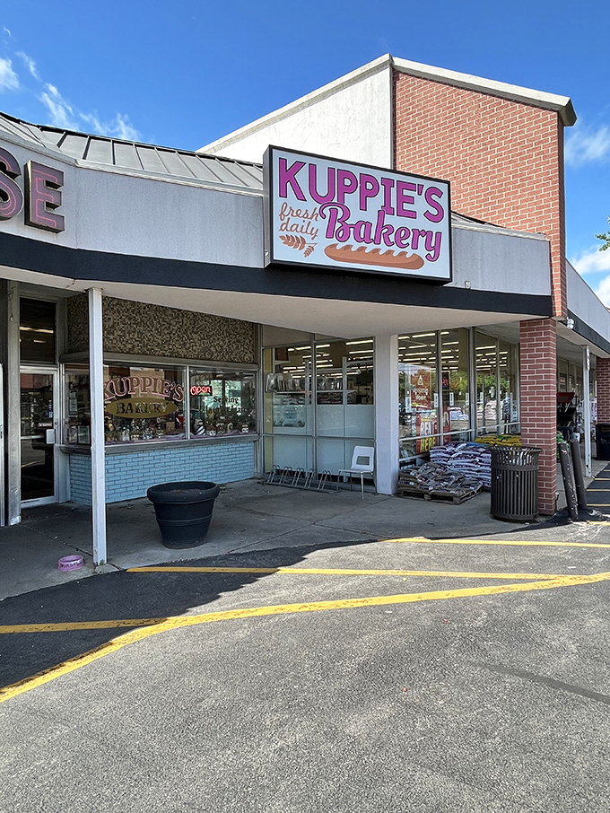 Welcome to donut heaven! Kuppie's Bakery beckons with its cheerful pink sign, promising a sugar-coated adventure that'll make your inner child squeal with delight.