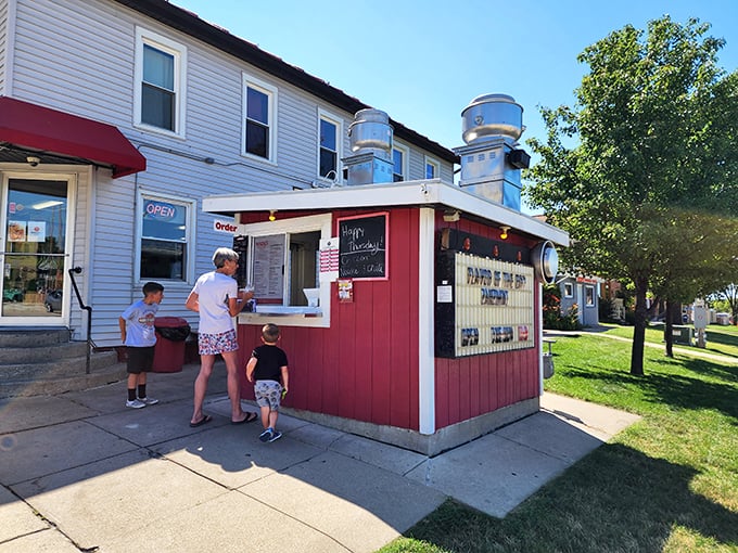 Step right up to flavor town! Wedl's charming red stand is like a beacon of deliciousness in Jefferson, Wisconsin.