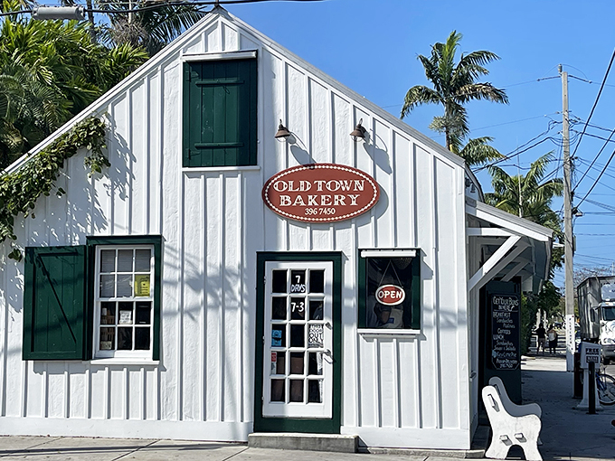 A slice of Key West heaven! This charming white building with green shutters is like a postcard come to life, beckoning you with promises of buttery bliss.