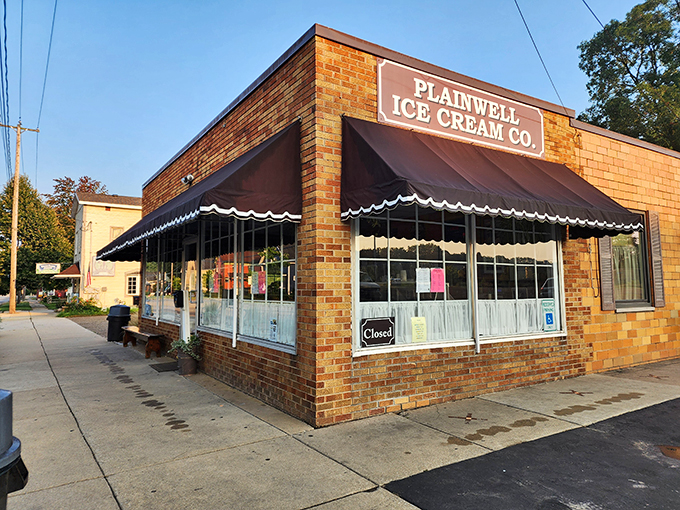 Step into a time machine disguised as an ice cream parlor! Plainwell Ice Cream Co.'s charming exterior promises a sweet escape from the modern world.