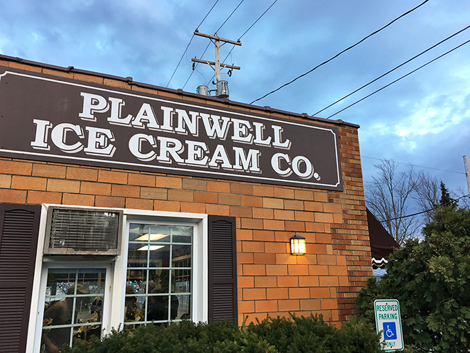 Step into a time machine disguised as an ice cream parlor! Plainwell Ice Cream Co.'s charming exterior promises a sweet escape from the modern world.