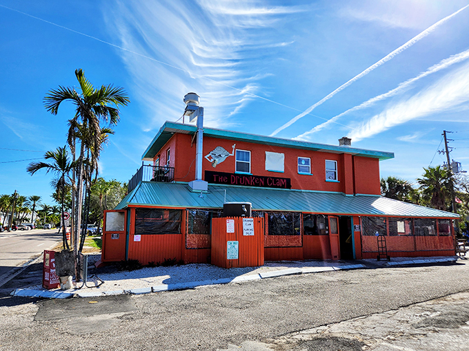 A splash of tropical flair! The Drunken Clam's vibrant exterior is like a Jimmy Buffett song come to life, inviting you to kick back and relax.