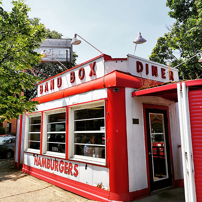 Step into a time warp! This little red-and-white diner looks like it popped straight out of a 1950s postcard.