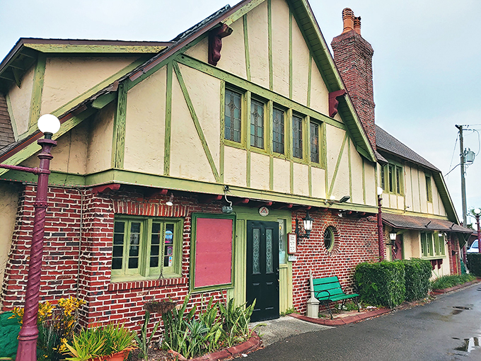 A Tudor-style time machine! This charming exterior whisks you away to a cozy English cottage, right in the heart of Florida.