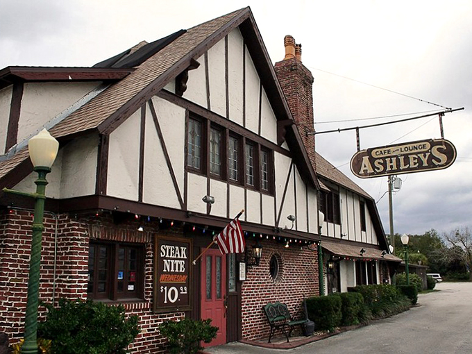 A Tudor-style time machine! This charming exterior whisks you away to a cozy English cottage, right in the heart of Florida.