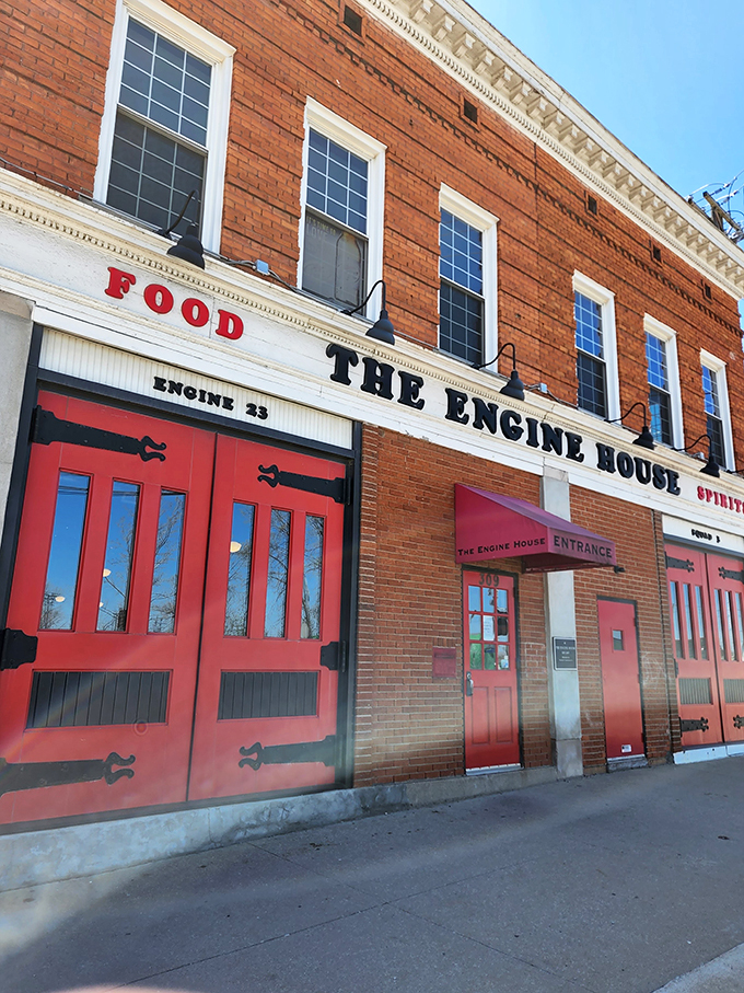 A beacon of culinary delight! The Engine House's brick exterior and bright red doors beckon like a siren's call to hungry souls.