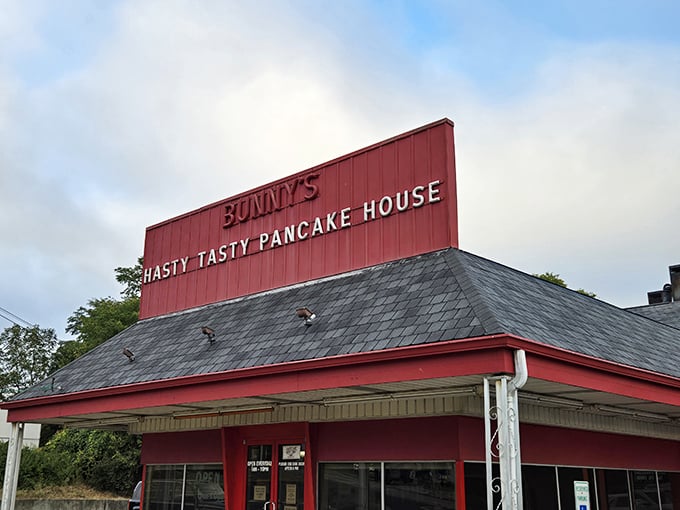 A red beacon of comfort food hope! Bunny's Hasty Tasty Pancake House stands proud, promising fluffy stacks and homestyle charm.