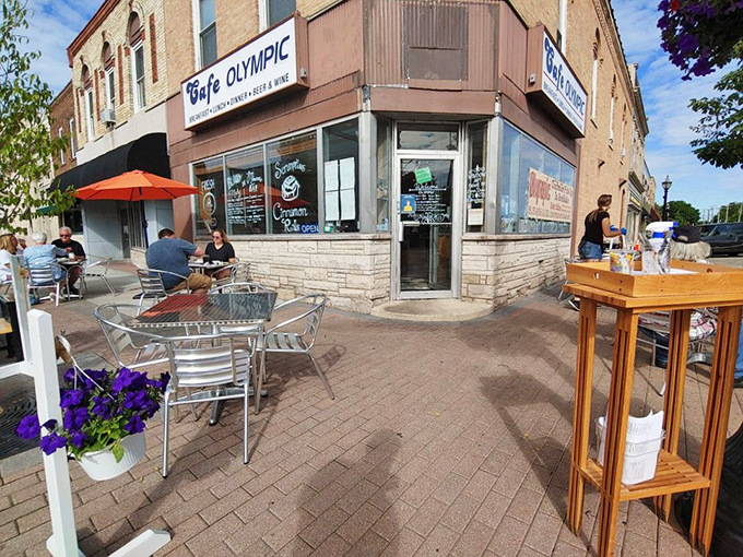 A slice of small-town charm! Cafe Olympic's cozy corner invites you to savor breakfast bliss under the Illinois sky.