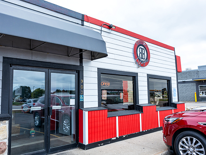 Welcome to burger paradise! Bergstrom's exterior is a retro-chic beacon, calling all hungry souls like a 1950s time machine with a side of fries.