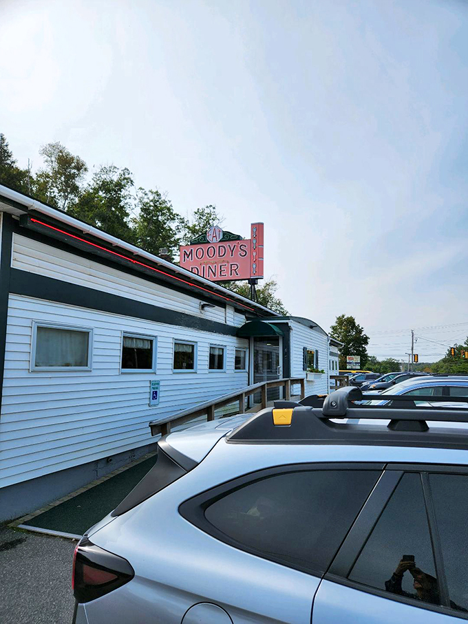 A slice of Americana served with a side of Maine charm. Moody's Diner stands proud, its iconic sign a beacon for hungry travelers since 1927.