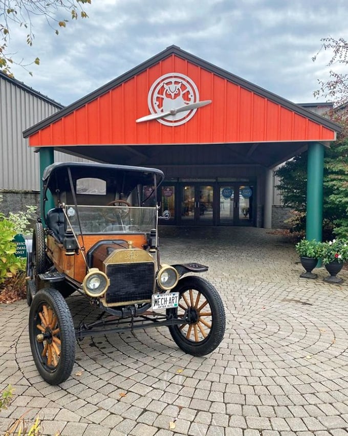 Welcome to the Owls Head Transportation Museum, where history meets horsepower! This vintage beauty greets visitors like a time-traveling valet service.
