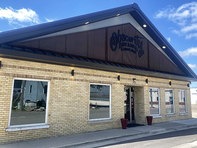 Obscurity Brewing: Where small-town charm meets big-time flavor. This unassuming exterior hides a world of culinary delights and craft brews waiting to be discovered.