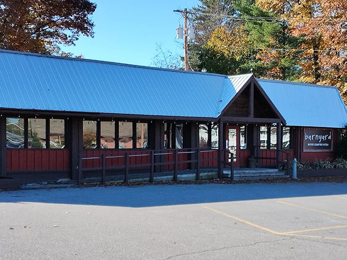 A rustic red barn meets cozy diner? Barnyard Wood Crafted Pizza's exterior promises a feast that's anything but farmyard fare!