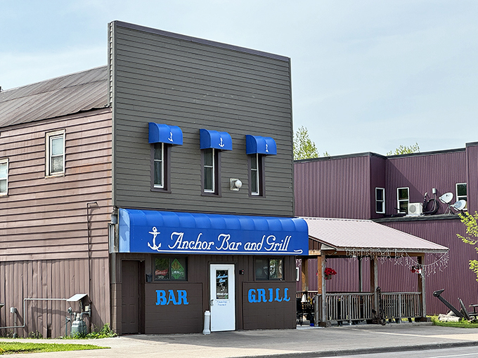 Ahoy, burger lovers! The Anchor Bar's blue awning beckons like a siren song, promising a voyage into comfort food paradise.
