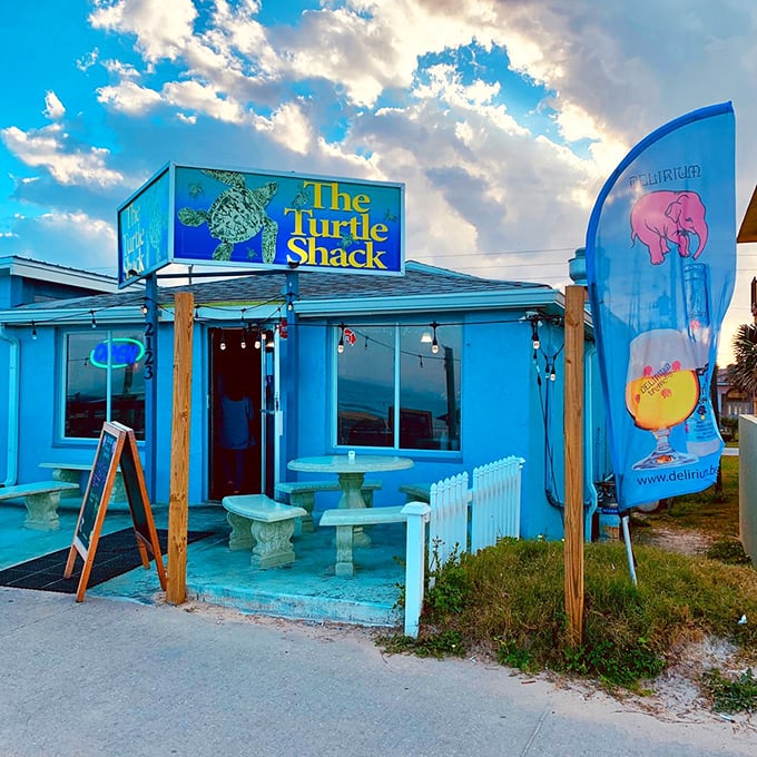 Blue as the Florida sky, this beachside shack beckons like a siren's call. Who needs a fancy facade when you've got charm and character by the bucketful?