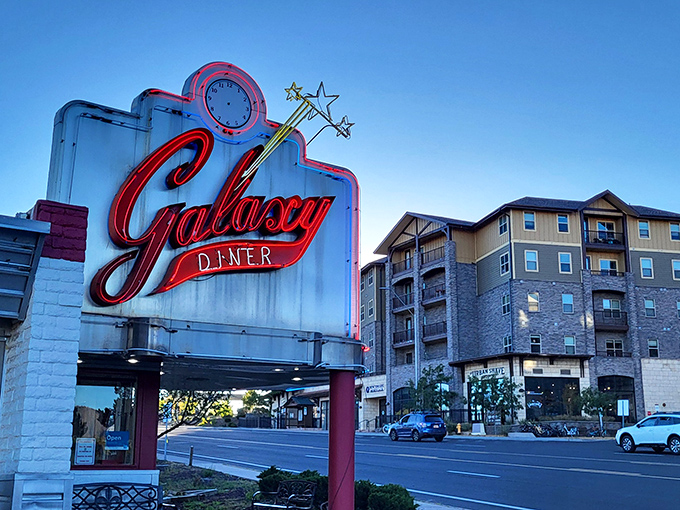 Houston, we have a diner!" This cosmic sign beckons hungry time travelers to Galaxy Diner, where the '50s are always in orbit and the milkshakes are out of this world.