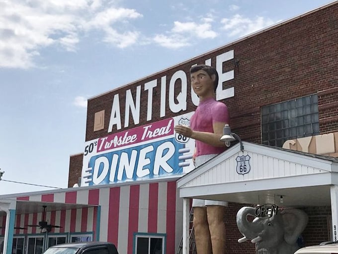 Step right up to the Pink Elephant Antique Mall! With its giant ice cream cone and retro diner, it's like a time machine disguised as a building.