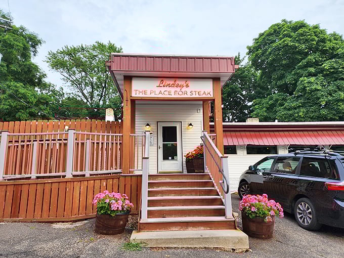 Welcome to steak paradise! Lindey's neon sign beckons like a carnivore's North Star, guiding hungry souls to beefy bliss.