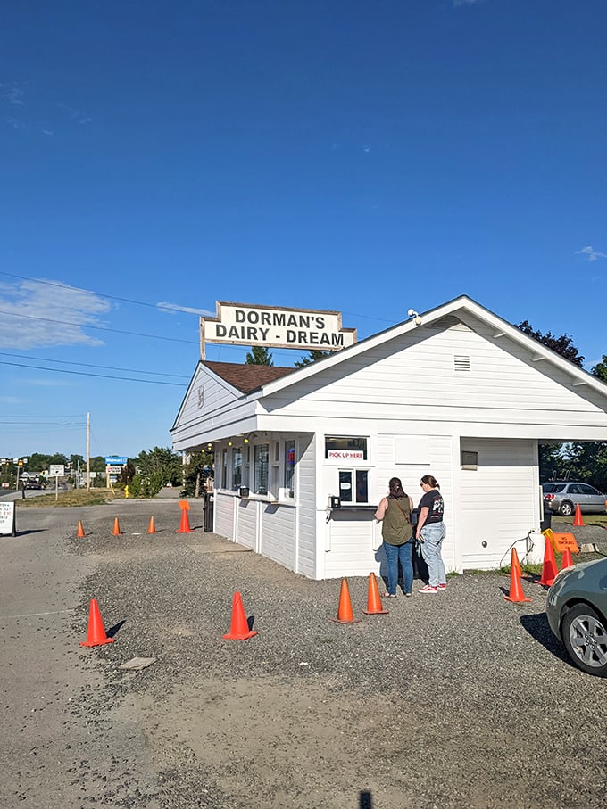 A white beacon of frozen delight beckons from the roadside. Dorman's Dairy Dream: where calories don't count and smiles are served by the scoop.