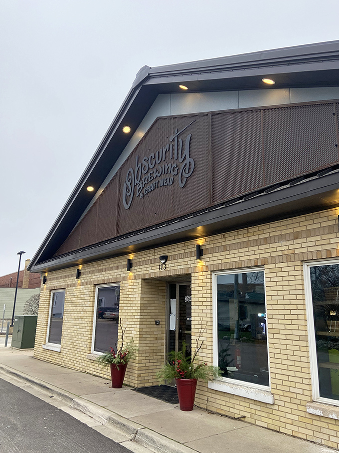 Obscurity Brewing: Where small-town charm meets big-time flavor. This unassuming exterior hides a world of culinary delights and craft brews waiting to be discovered.