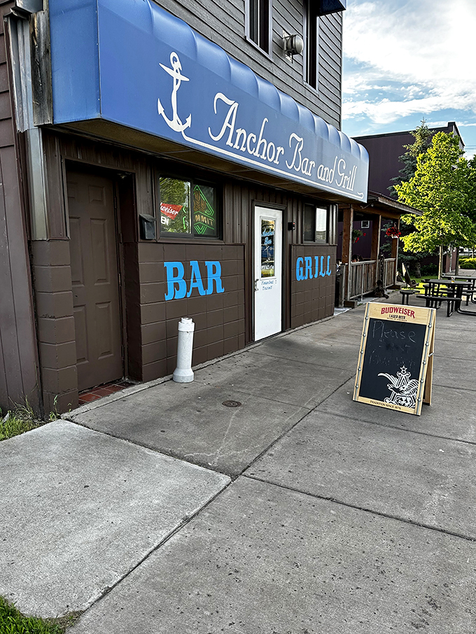 Ahoy, burger lovers! The Anchor Bar's blue awning beckons like a siren song, promising a voyage into comfort food paradise.
