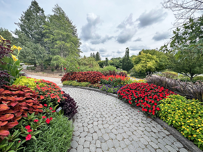A winding path through floral paradise! This garden's color palette puts Monet to shame, proving nature's the ultimate artist.