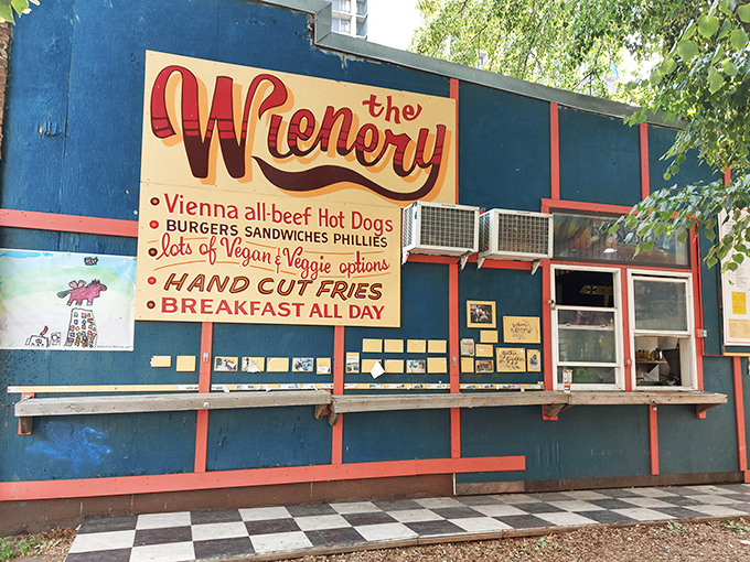 Welcome to The Wienery, where the exterior is a s charming as a Norman Rockwell painting come to life. This tiny brick building promises big flavors and even bigger personalities inside.
