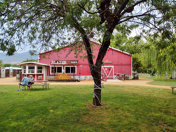 Welcome to the Wild West, pardner! This big red barn isn't just for horses &ndash; it's your gateway to cowboy adventures.