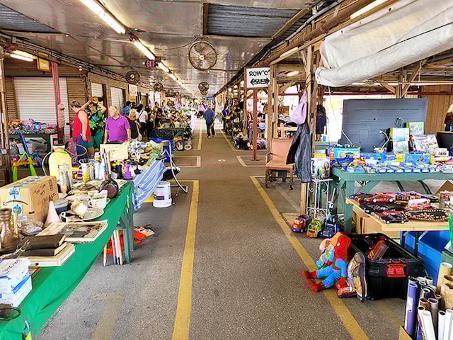 A shopper's paradise from the sky! Fleamasters Fleamarket sprawls like a treasure-filled metropolis, promising adventures in every aisle. Who needs a map when you've got curiosity?