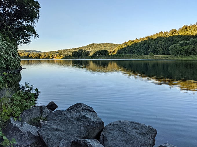 Mirror, mirror on the lake! Wilgus State Park's tranquil waters reflect Vermont's beauty like nature's own Instagram filter. Serenity: downloaded.