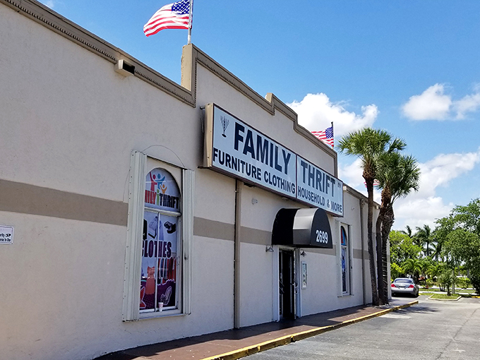 Welcome to the bargain hunter's Shangri-La! Family Thrift Store's exterior promises treasures within, with American flags waving you into a world of wallet-friendly wonders.
