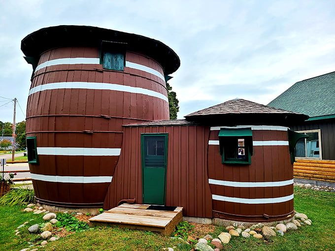A pickle's dream home! This two-story barrel-shaped wonder looks like it rolled right out of a Pixar movie and into charming Grand Marais.
