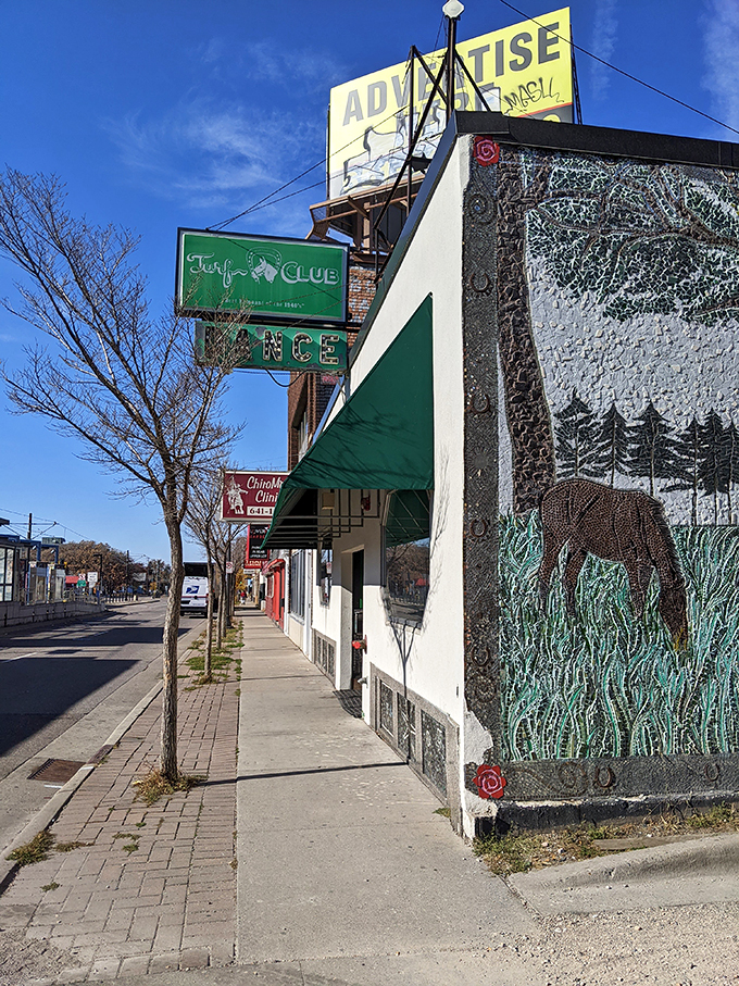 Rock 'n' roll history meets small-town charm! The Turf Club's iconic green sign beckons music lovers like a siren song, promising unforgettable nights and legendary tunes.