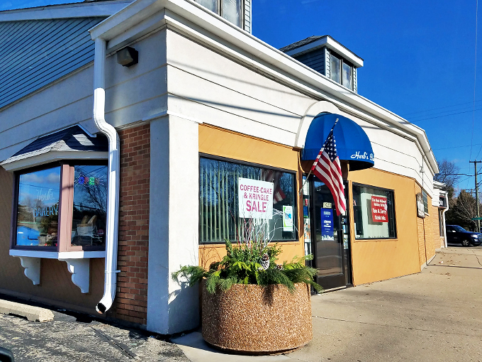 A slice of Americana with sprinkles on top! Herb's Bakery stands proud, its blue awning and American flag waving a sugary hello to passersby.