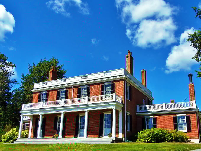 "Honey, I think we shrunk the White House!" This grand brick mansion could give 1600 Pennsylvania Avenue a run for its money in the stately department.