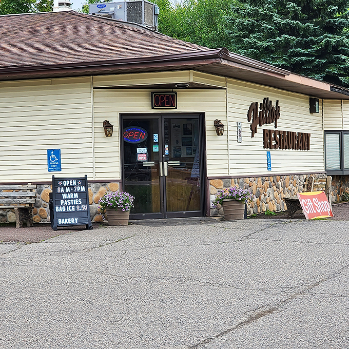 Welcome to carb heaven! The Hilltop Restaurant's unassuming exterior belies the comfort food paradise within. It's like finding a treasure chest of deliciousness in the Upper Peninsula.