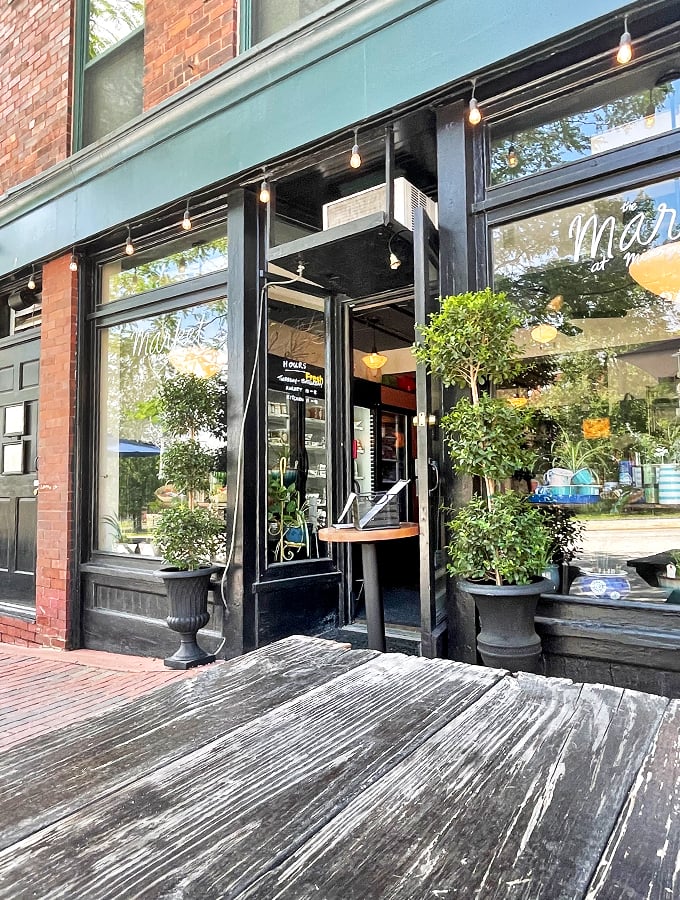 Welcome to Misery Loves Co., where the only thing gloomy is the name! This charming storefront promises a culinary adventure that'll turn your frown upside down.